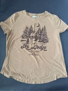 Maurices | Tops | Maurices Tan Ski Lodge Graphic Short Sleeve Tee ...
